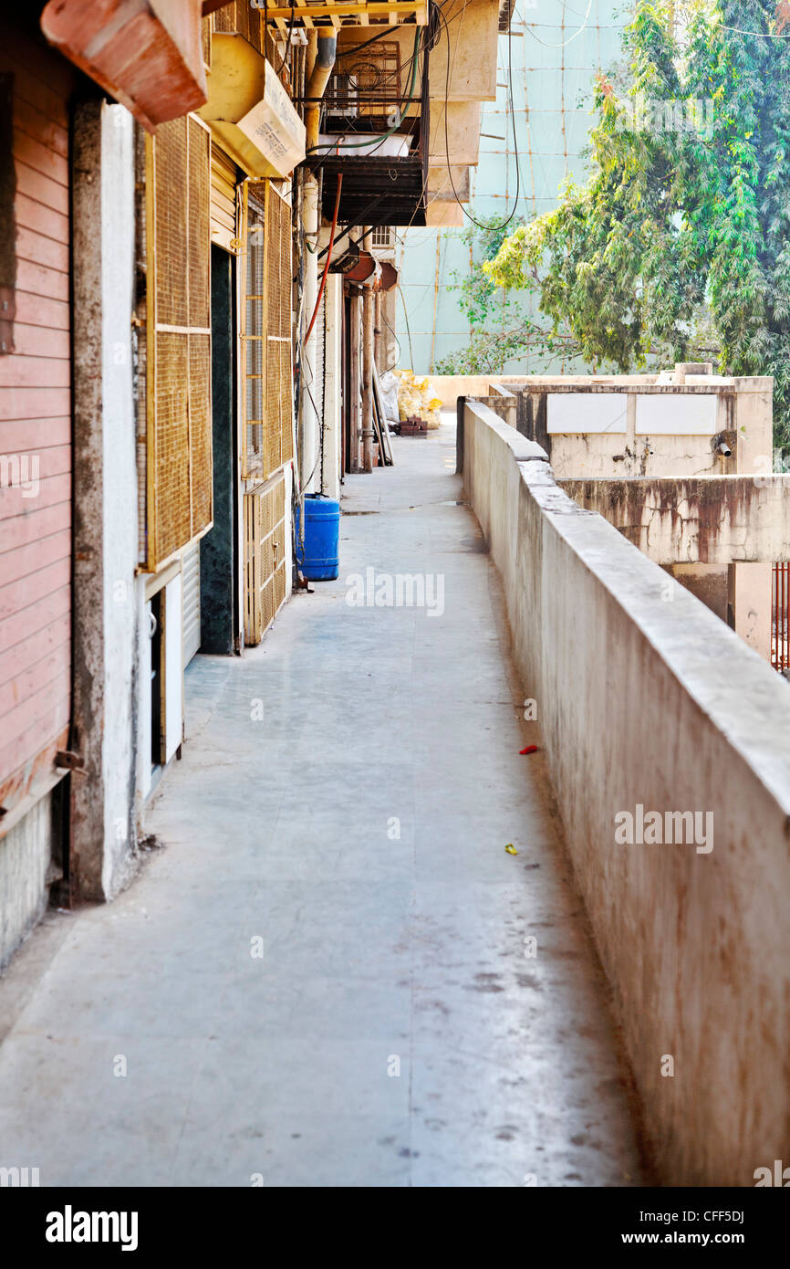 Mumbai, India, corridor serving industrial units on the first floor of ...