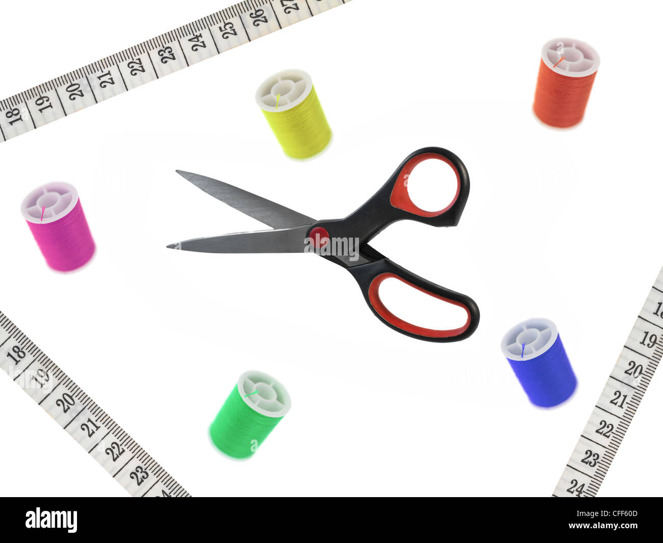 Sewing equipment isolated against a white background Stock Photo - Alamy