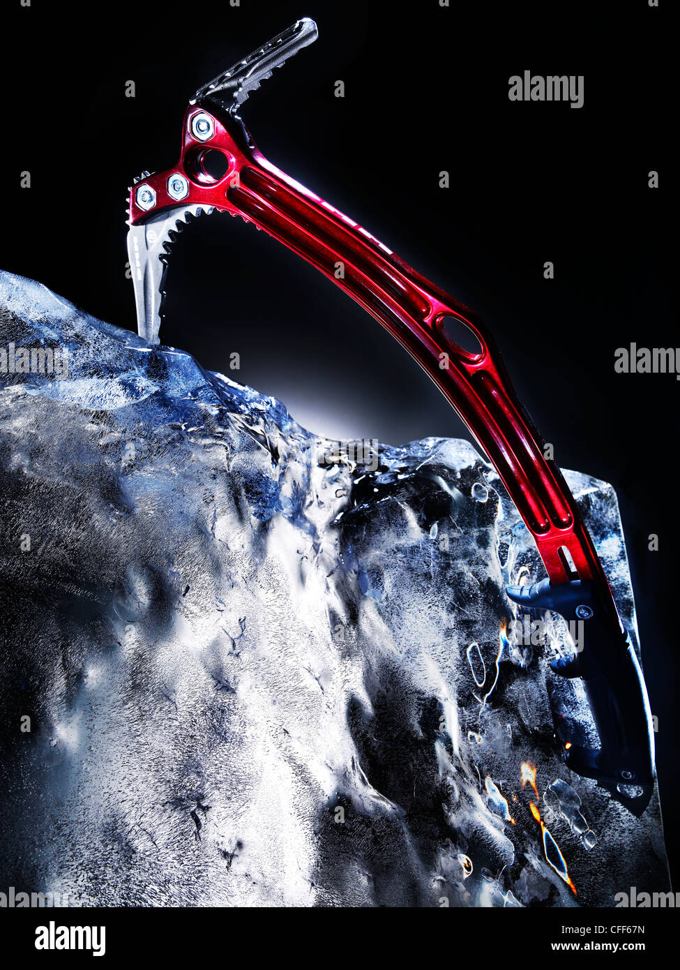 Ice pick in ice Stock Photo - Alamy