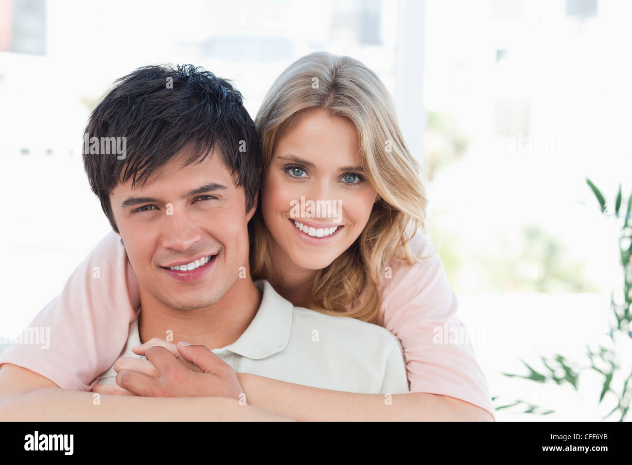 Young woman arms wrapped around hi-res stock photography and images - Alamy