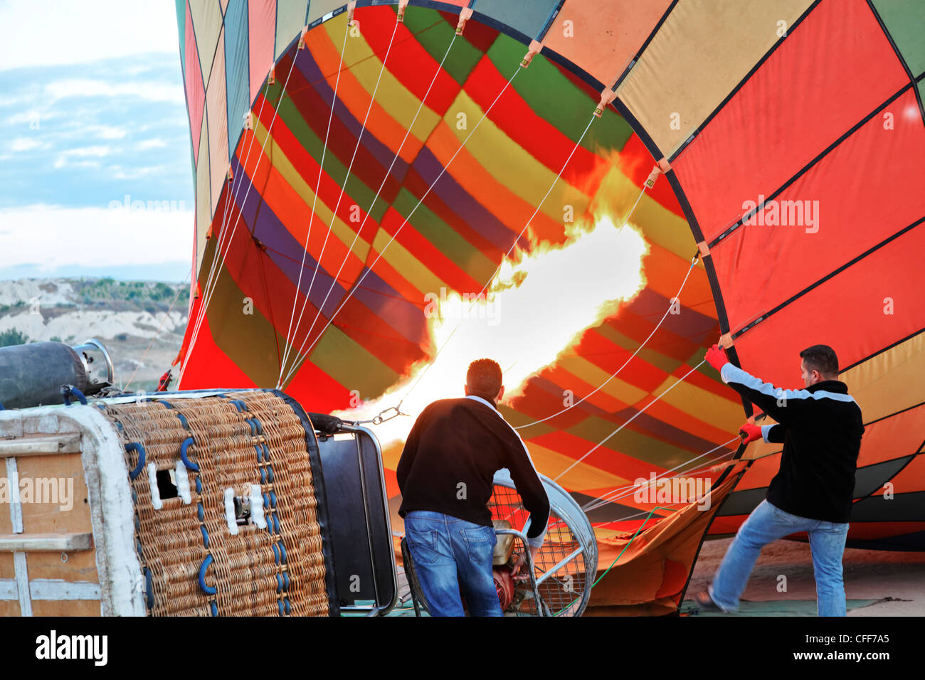Firing up the balloon for the nest batch of tourists in Cappadocia ...