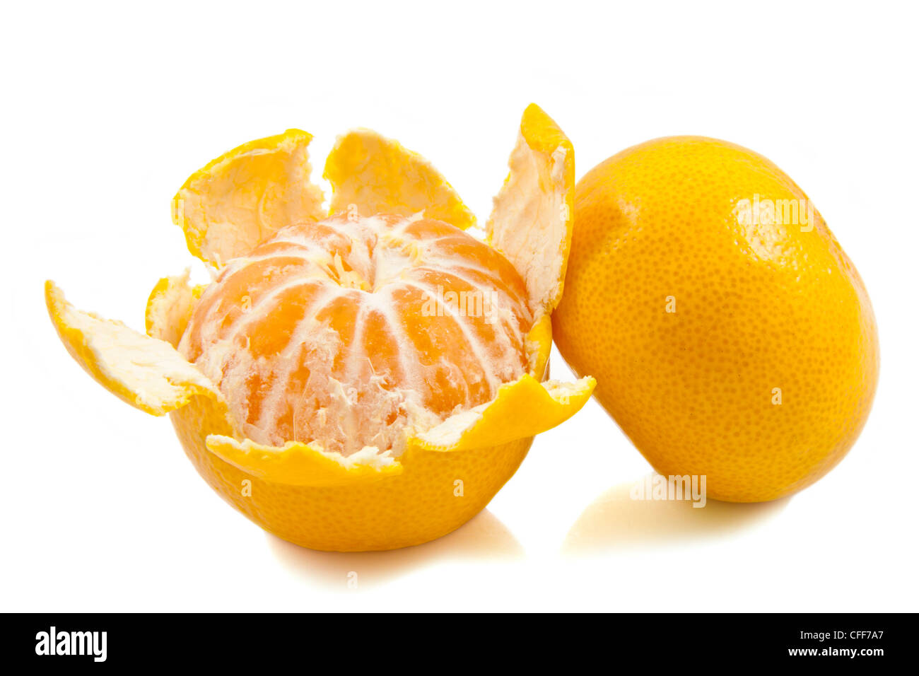 Two fresh juicy mandarins isolated over white Stock Photo - Alamy