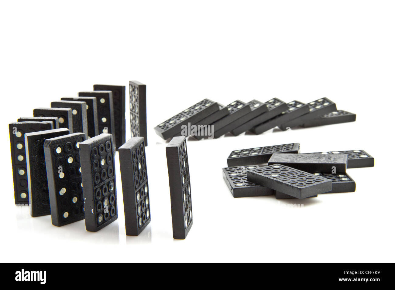 Domino stones in a row isolated over white Stock Photo - Alamy