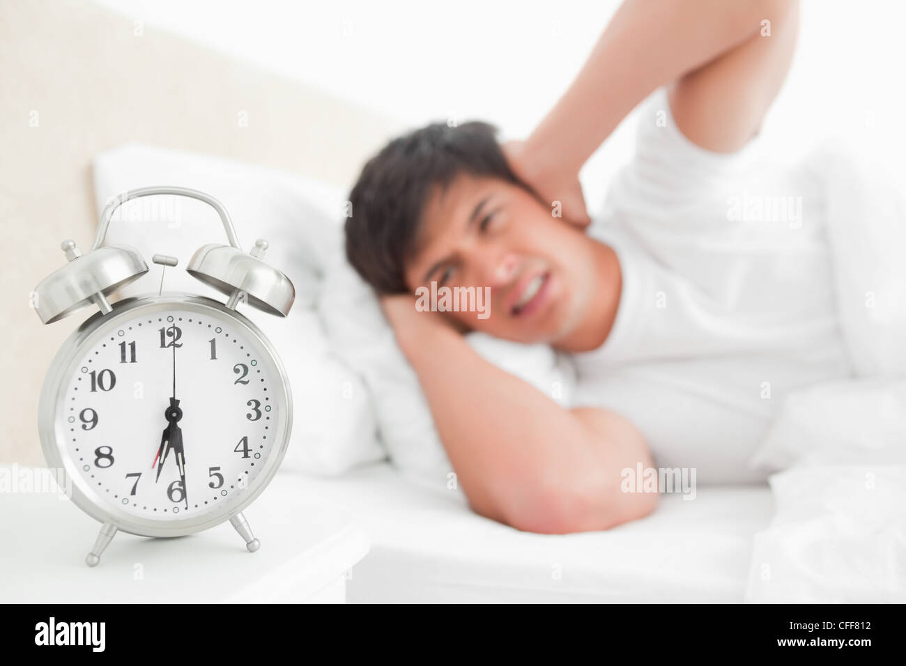 Young man covers eyes hands hi-res stock photography and images - Alamy