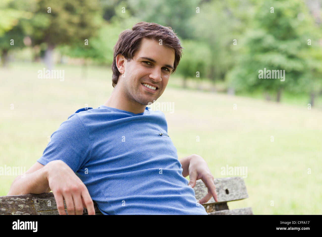 Leaning on a bench hi-res stock photography and images - Alamy