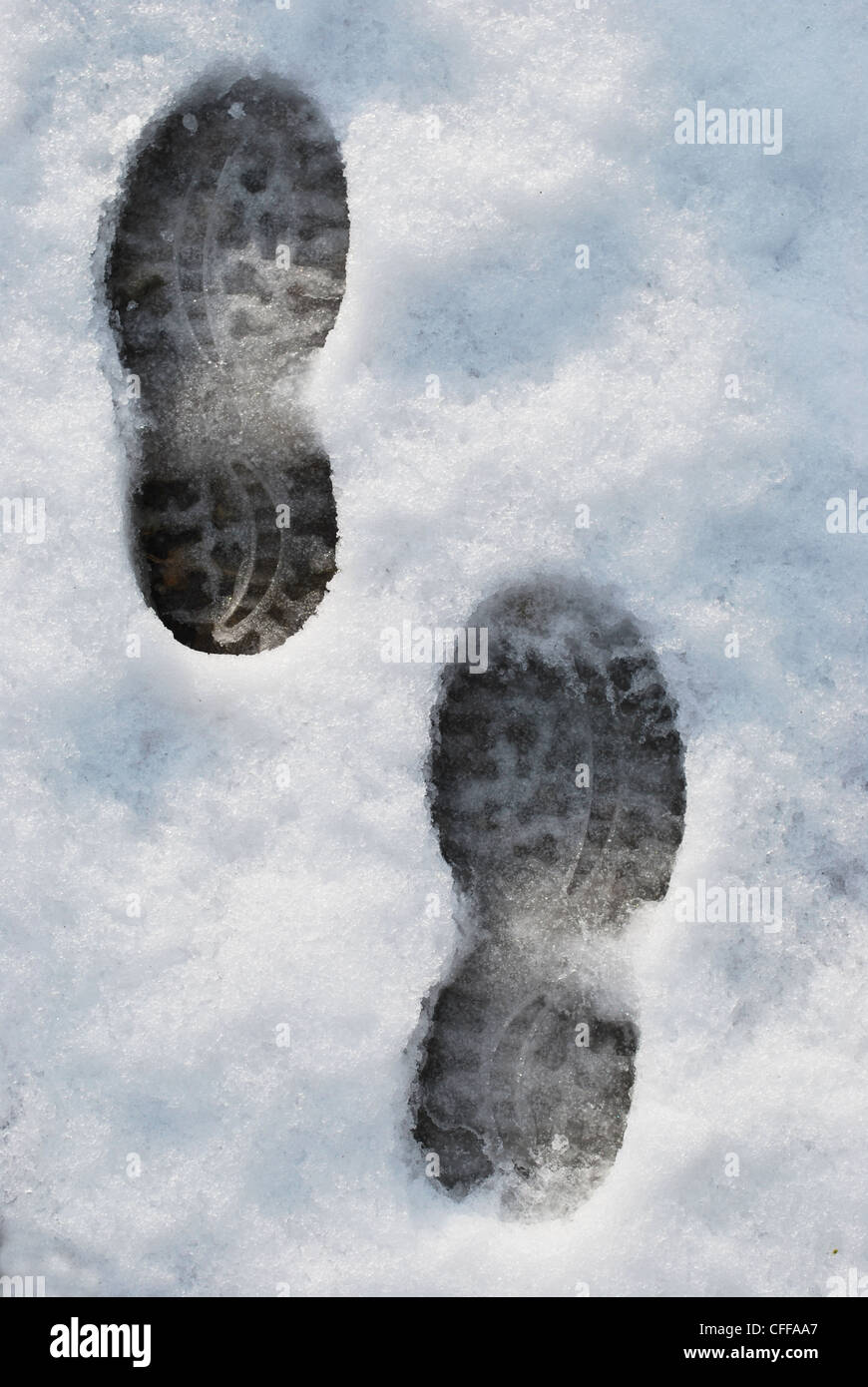 Two footprints in snow hi-res stock photography and images - Alamy