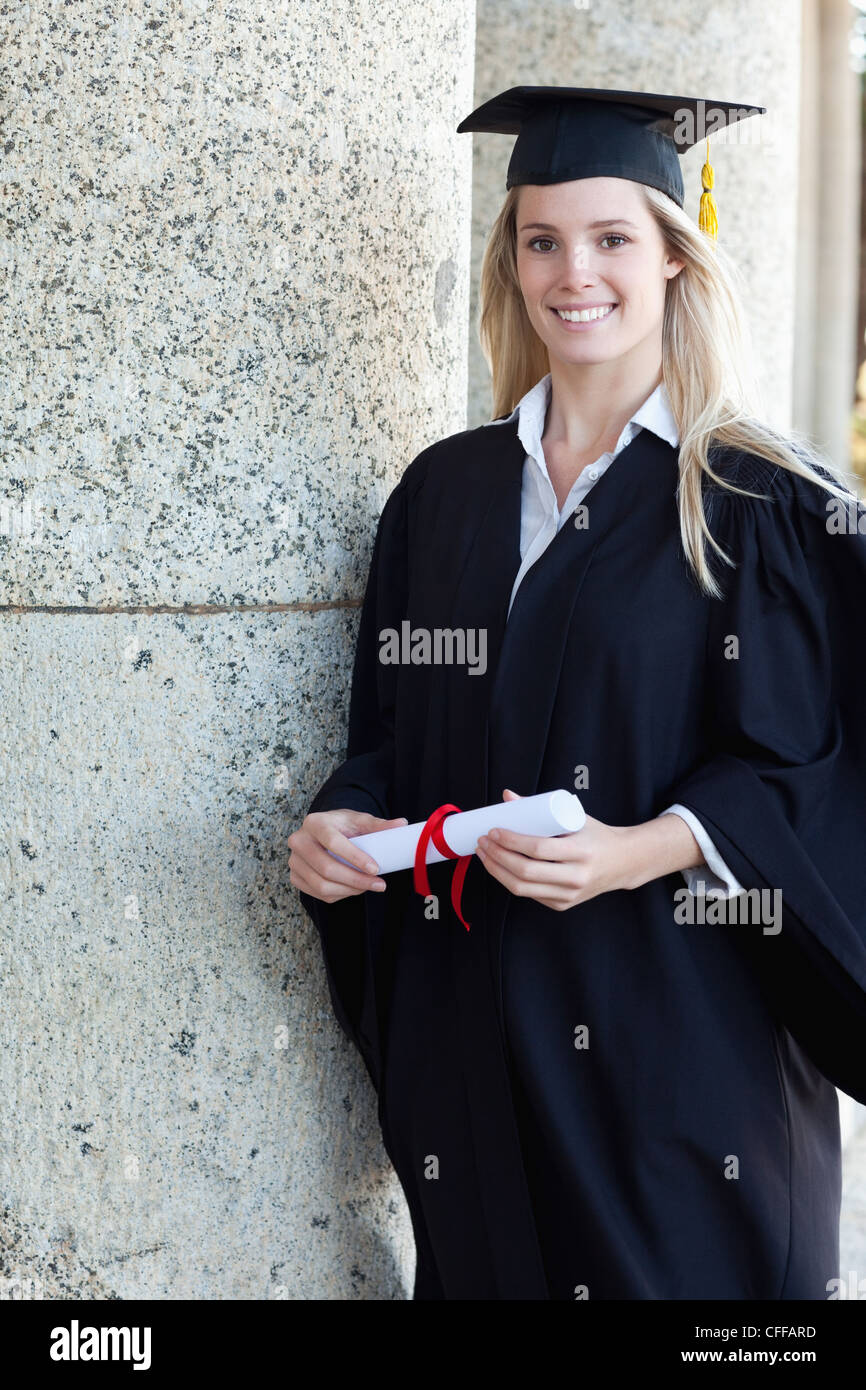 Graduating with diploma hi-res stock photography and images - Alamy