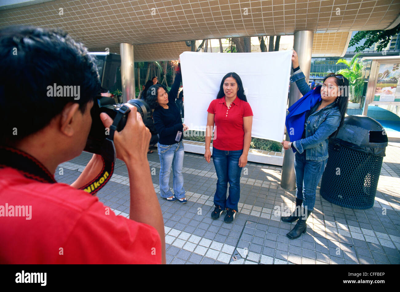 China, Hong Kong, Central, Street Portrait Photographer of Filipino ...