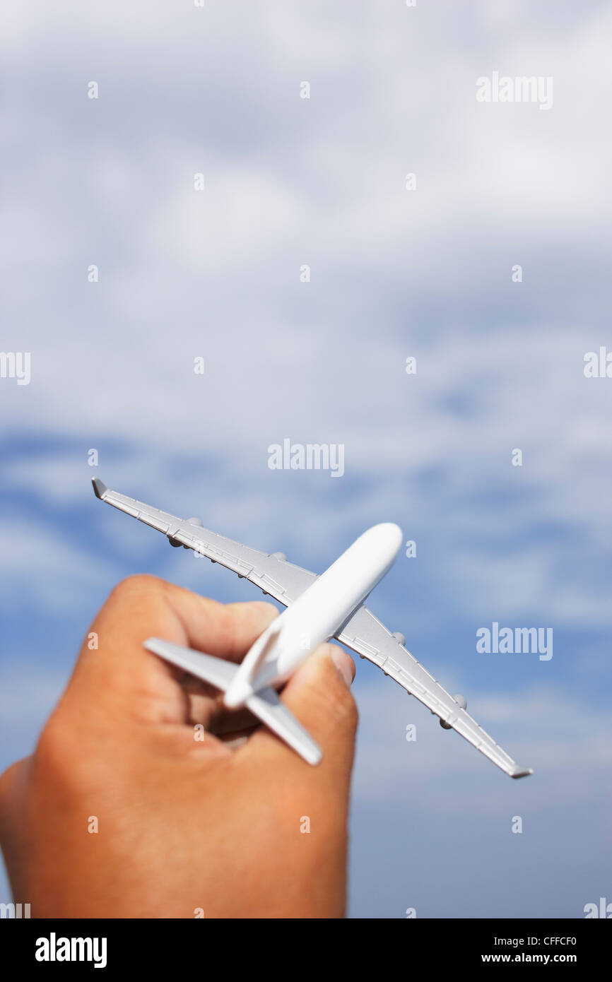 Hand Holding Toy Airplane Stock Photo - Alamy