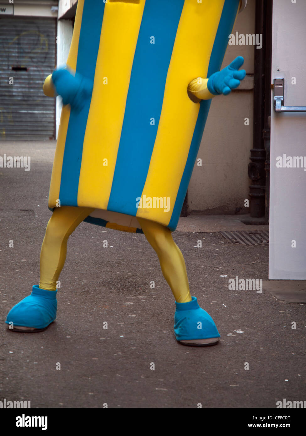 A paper cup on legs in Brighton Stock Photo - Alamy