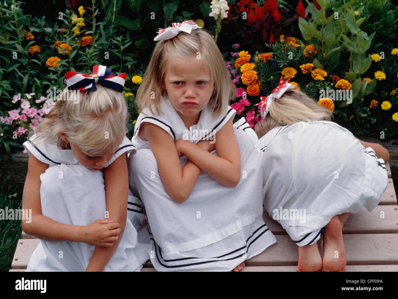 Identical triplets hi-res stock photography and images - Alamy