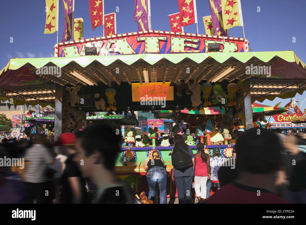 Crowd and Games at Amusement Park Stock Photo - Alamy