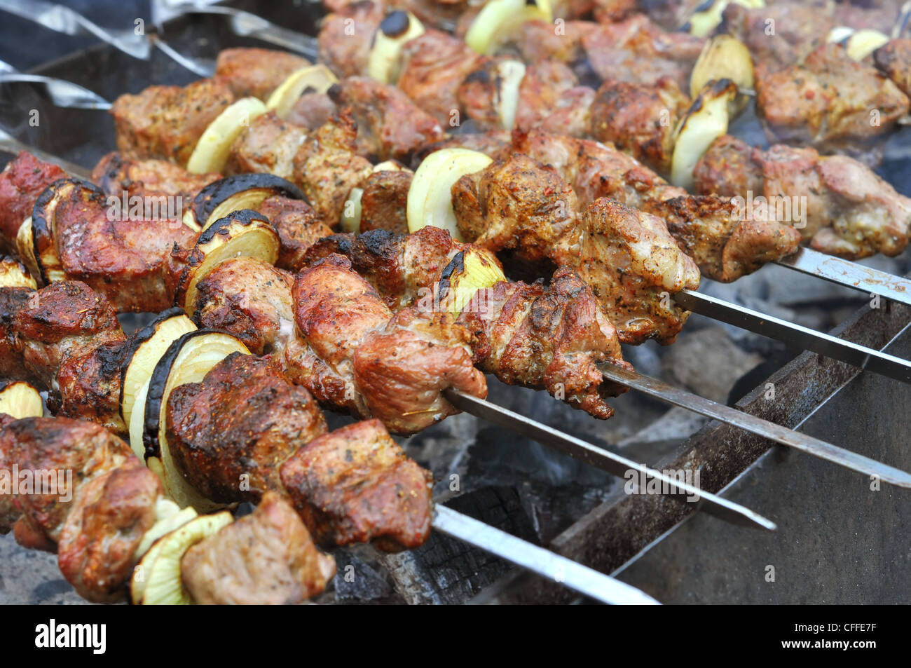 kebab prepares on the fire outdoors Stock Photo - Alamy