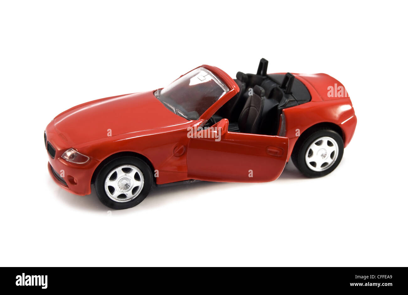 model of red car is isolated on a white background Stock Photo - Alamy