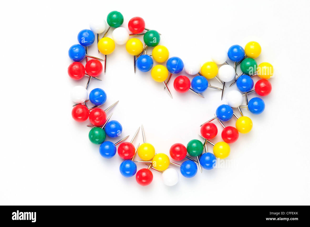 The image of heart from pins on a white background Stock Photo - Alamy