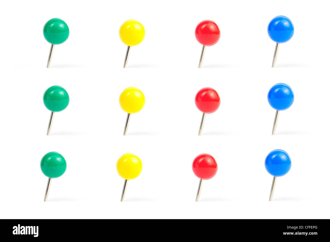 collection of various pushpins on white background. each one is shot ...