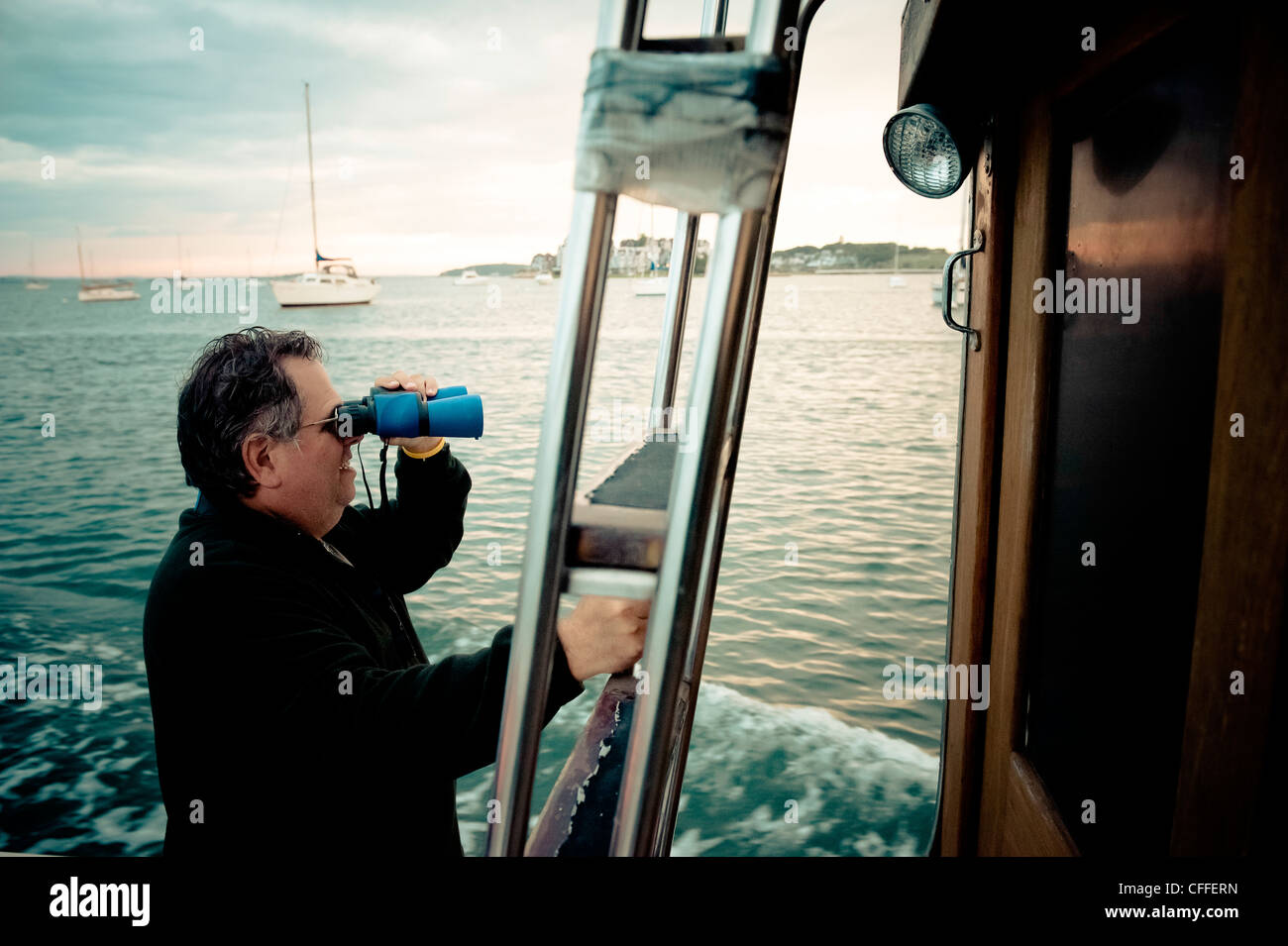 Binoculars sailing boat hi-res stock photography and images - Alamy