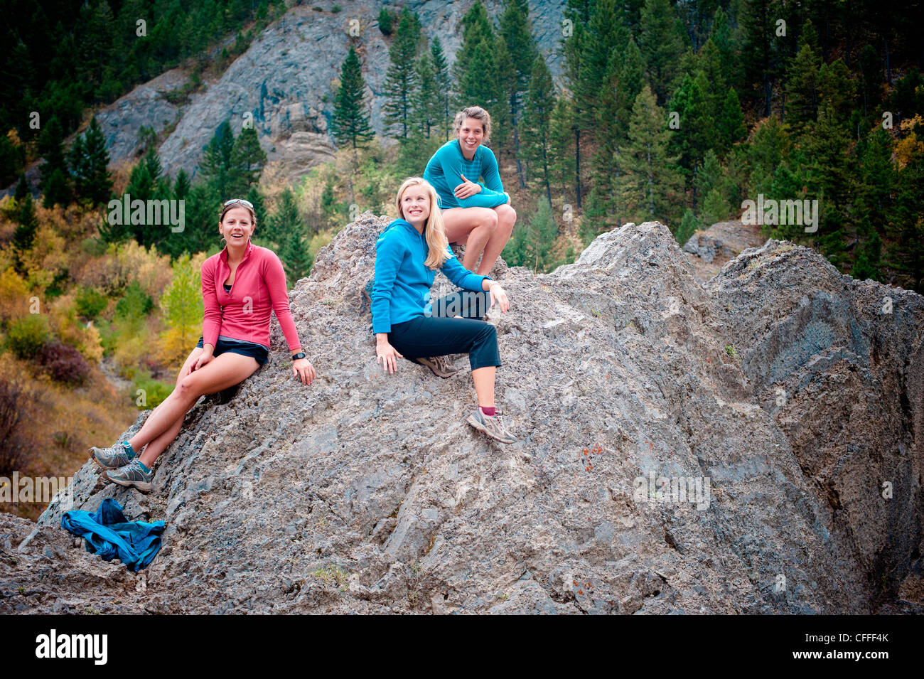 Three women take a hiking break Stock Photo - Alamy