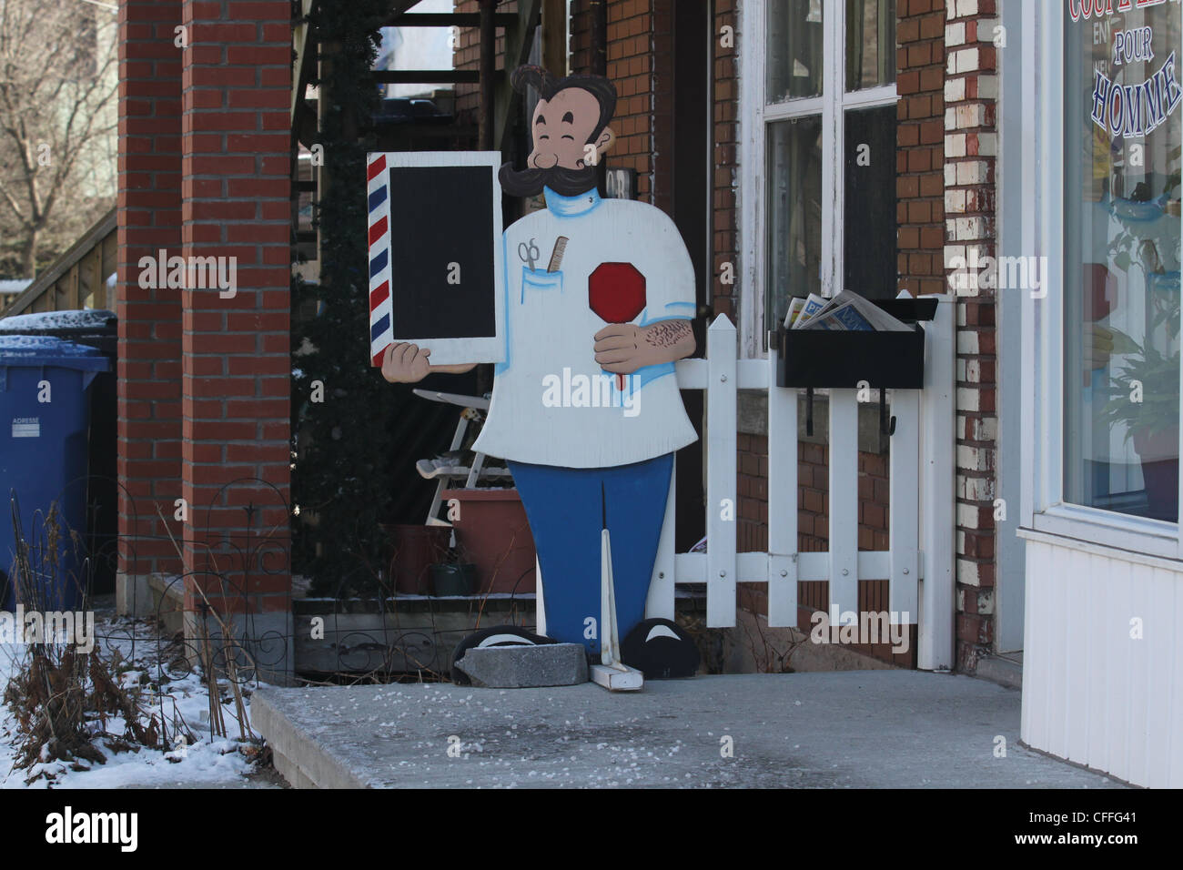 Barber shop with image of barber Stock Photo - Alamy