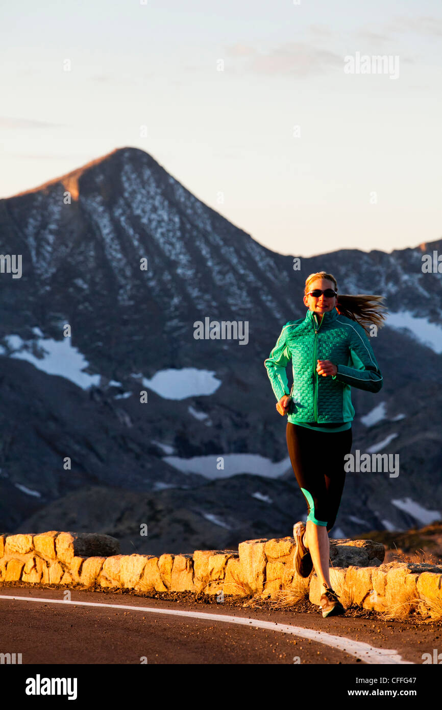 Woman running mountain ridge hi-res stock photography and images - Alamy