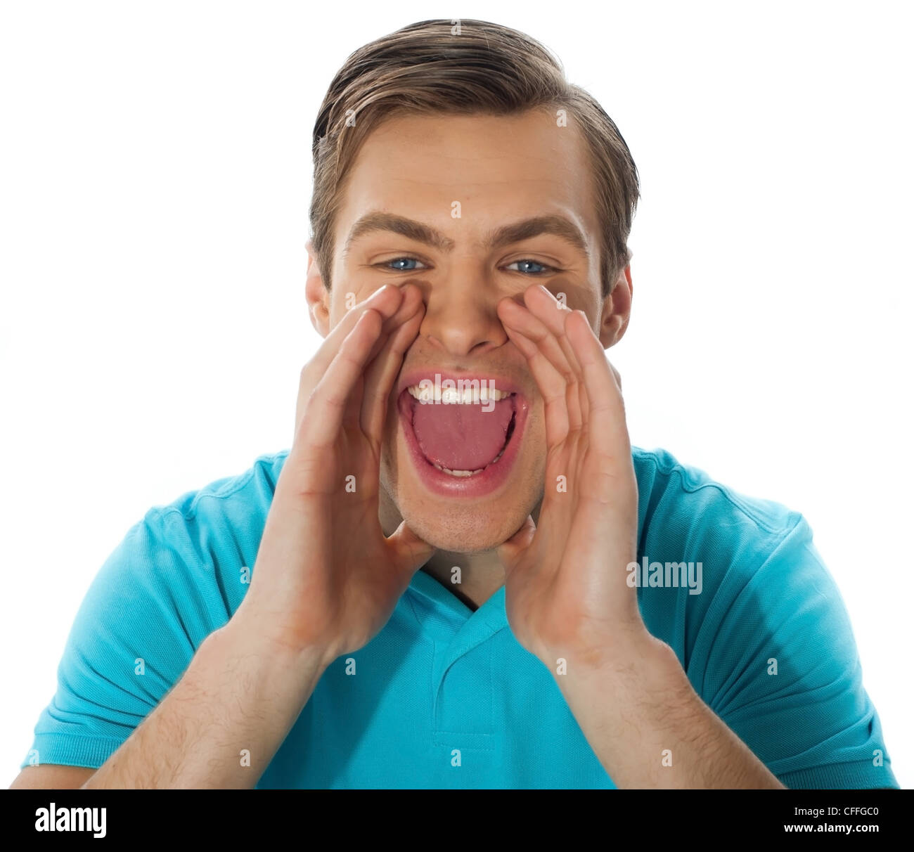 Exciting young handsome man shouting Stock Photo - Alamy