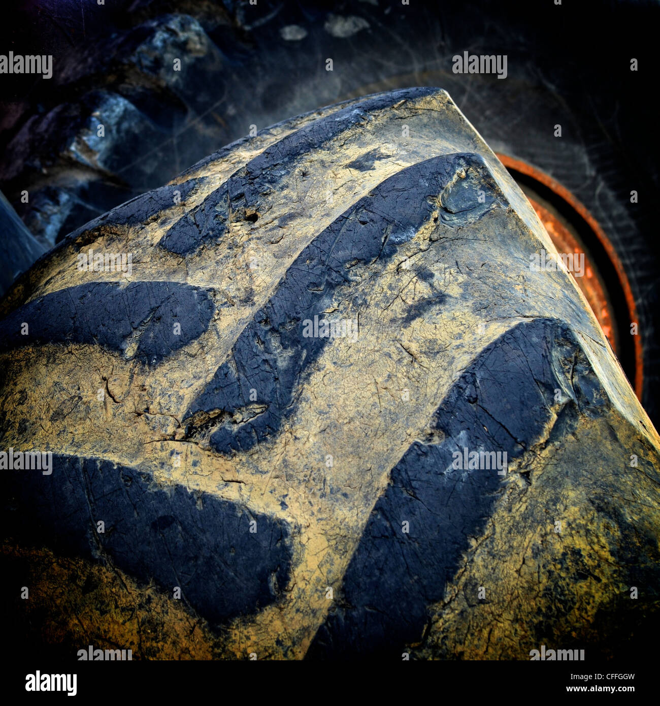 A cropped photo of old and worn-out heavy equipment tires Stock Photo ...