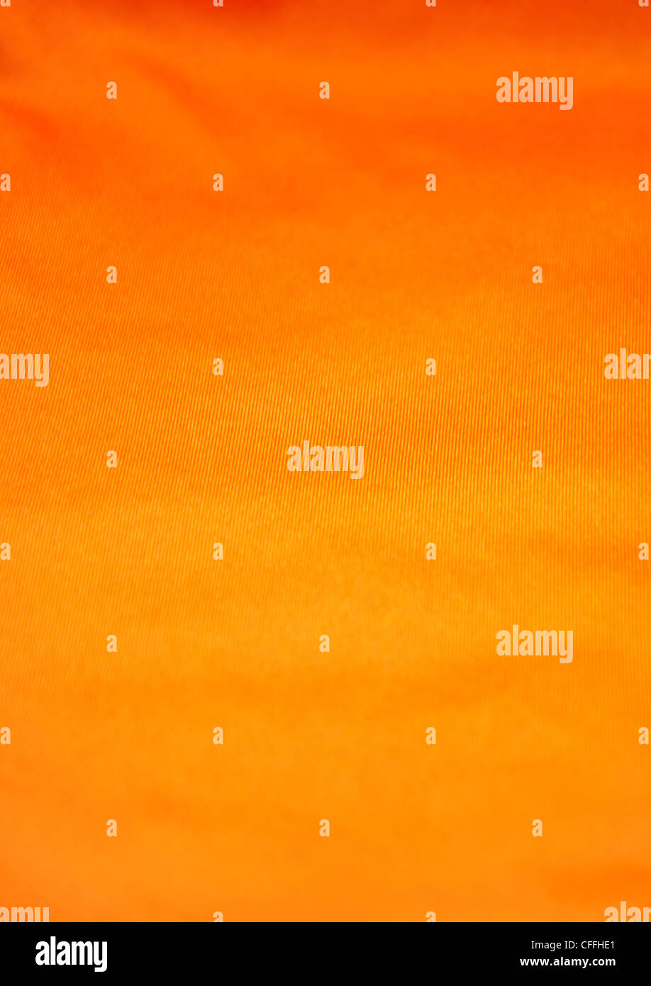 orange sport shirt texture background Stock Photo - Alamy