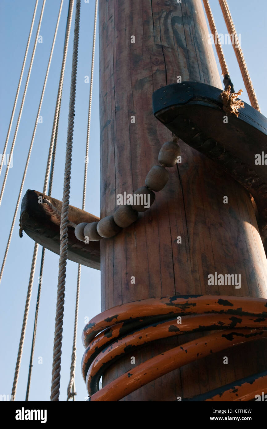 A wooden mast with rigging ropes and boom Stock Photo - Alamy