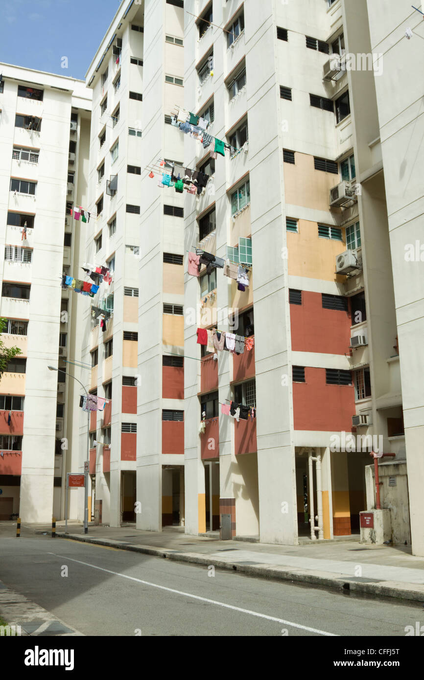 Washing lines hanging from windows of apartment blocks. Singapore Stock ...