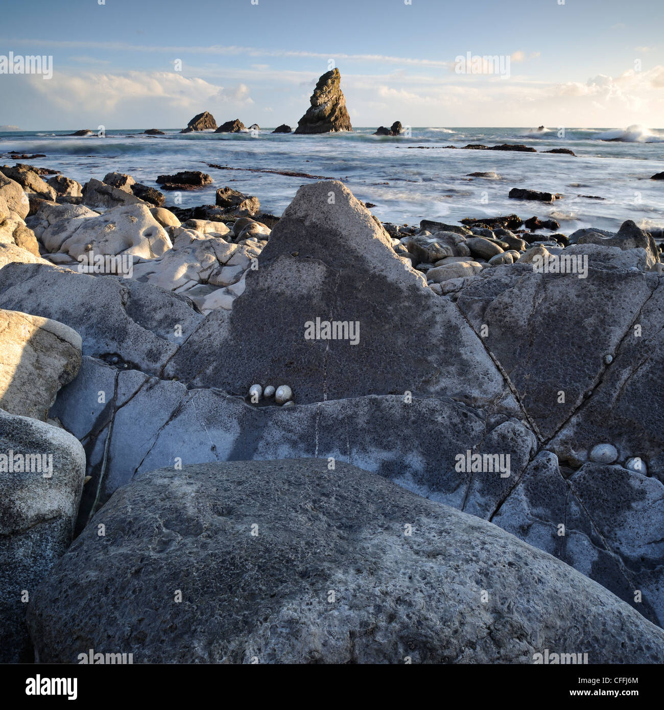Boulders and rock ledges during low tide at Mupe Rocks, Dorset, UK ...