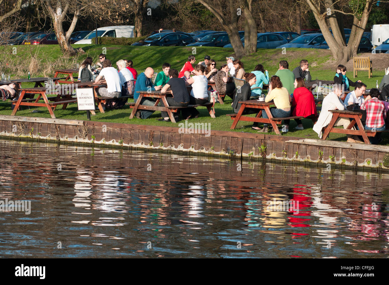 A beer garden on the banks of the river Cam at Fen Ditton ...