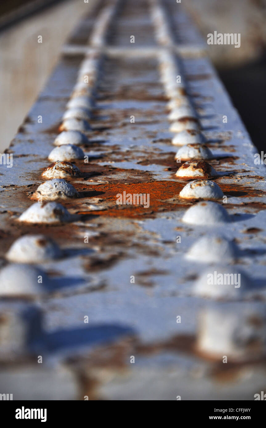Rusting steelwork showing flaking paintwork Stock Photo - Alamy