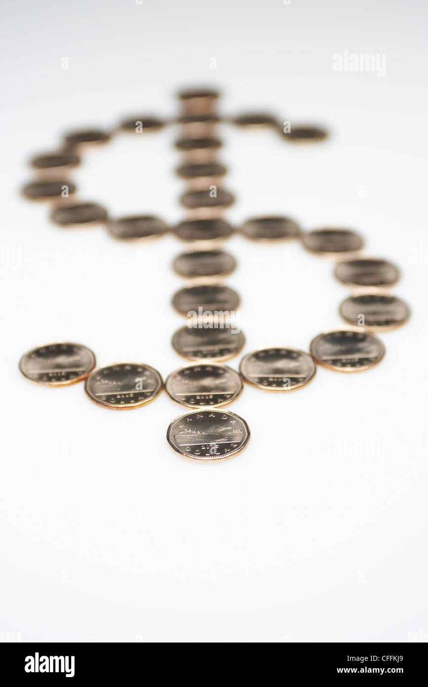 Loonie Coins in Dollar Sign Symbol Stock Photo - Alamy
