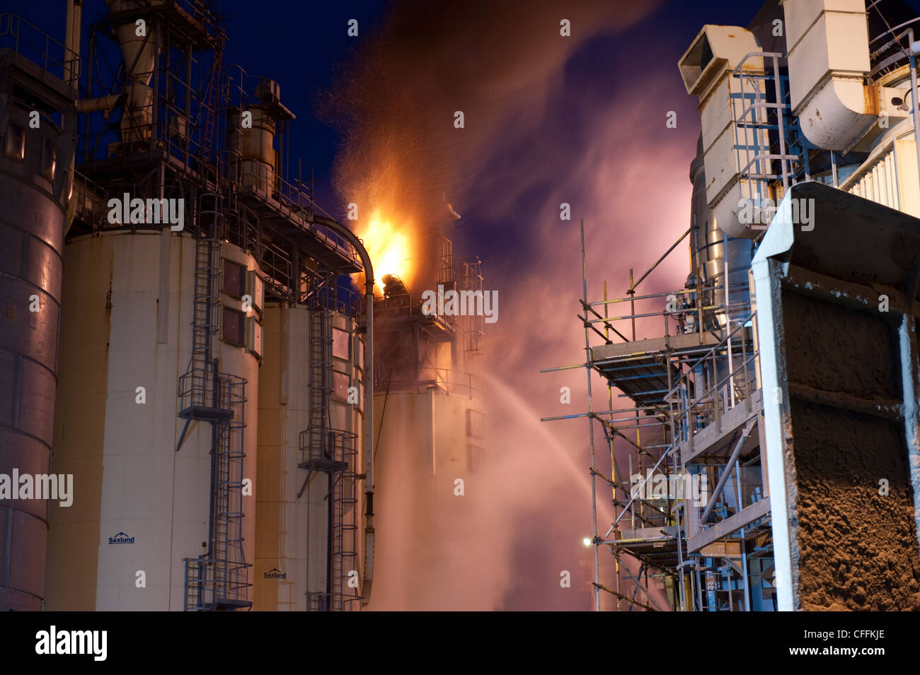 Industrial Factory Hopper on Fire at Night UK Stock Photo - Alamy