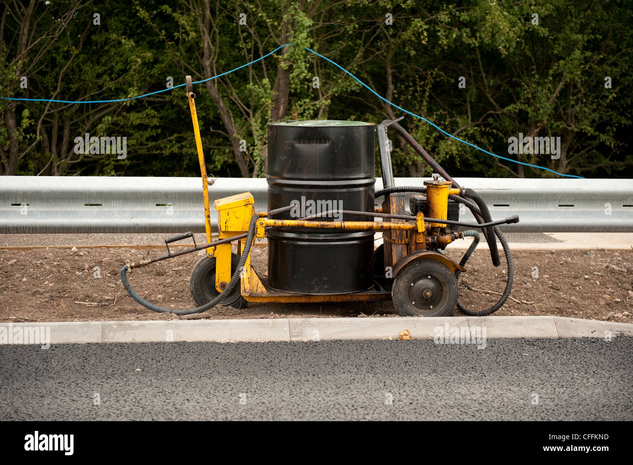 Road Repair Bitumen Spraying Machine UK Stock Photo - Alamy
