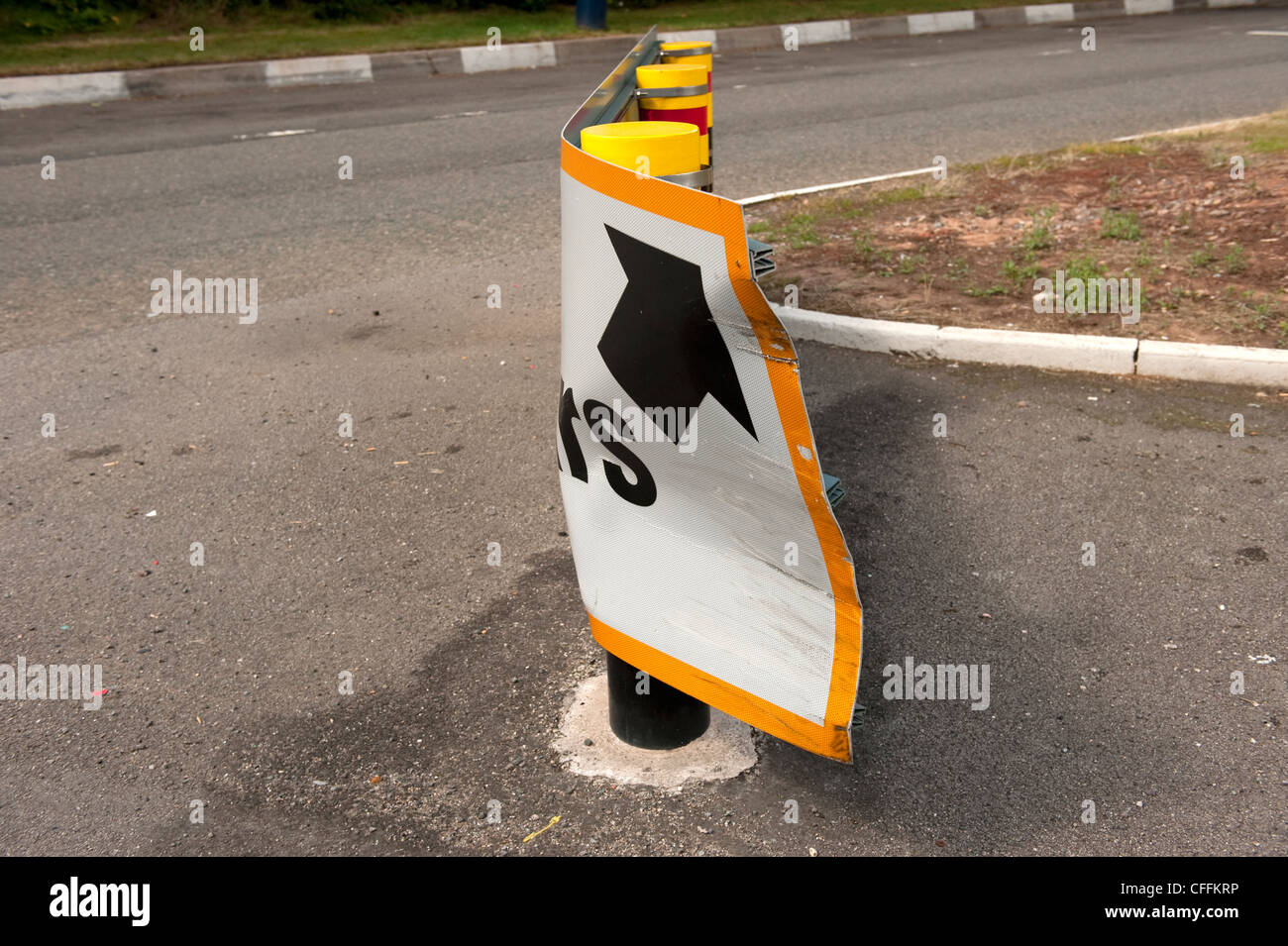 Bent smashed broken aluminum road sign Stock Photo - Alamy