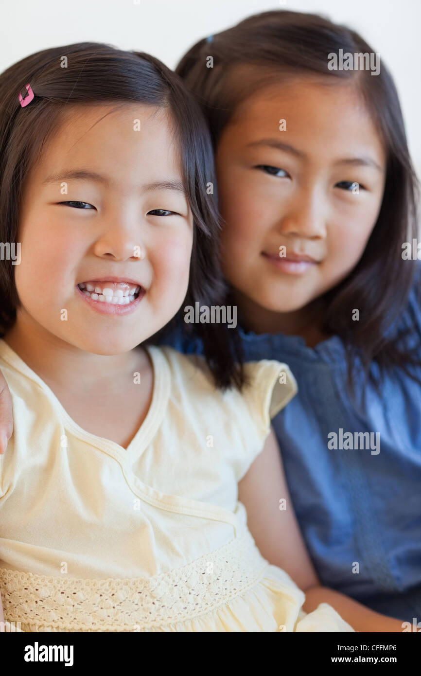 Close up portrait, two girls next to each other Stock Photo - Alamy