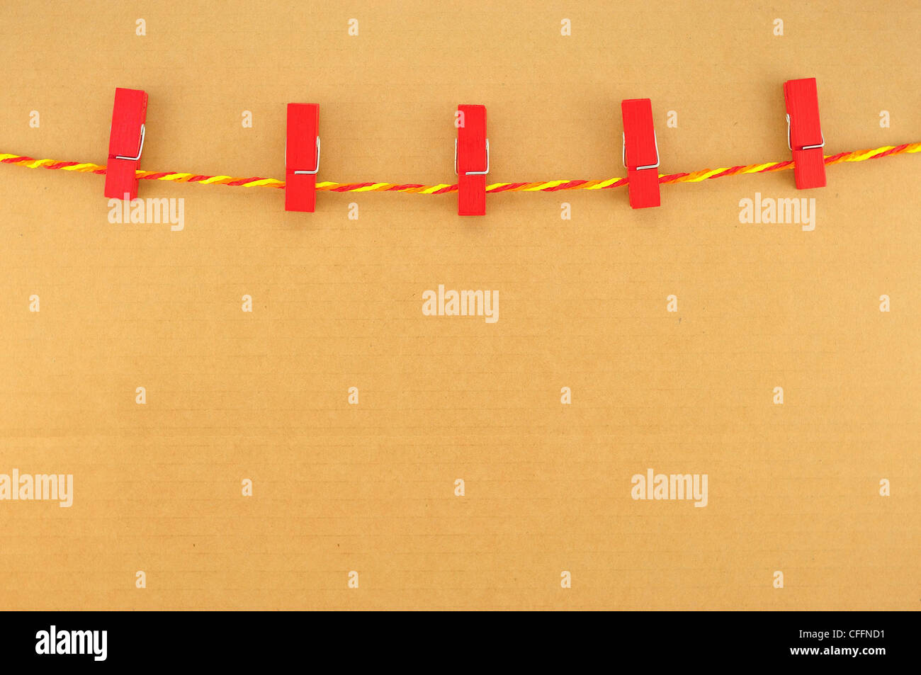 close up paper clip on cardboard on the rope Stock Photo - Alamy