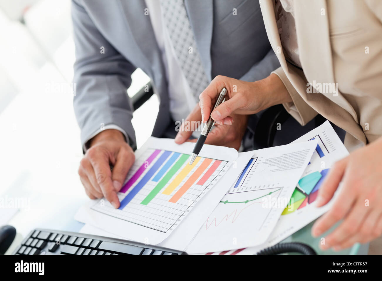 Two figures holding hi-res stock photography and images - Alamy