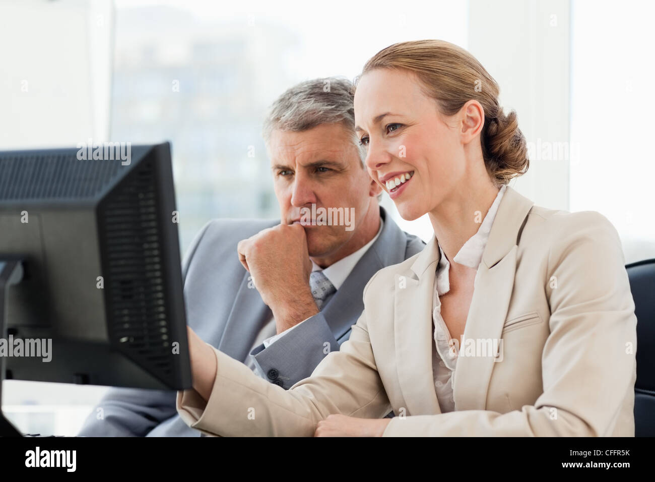 Business people using computer Stock Photo - Alamy
