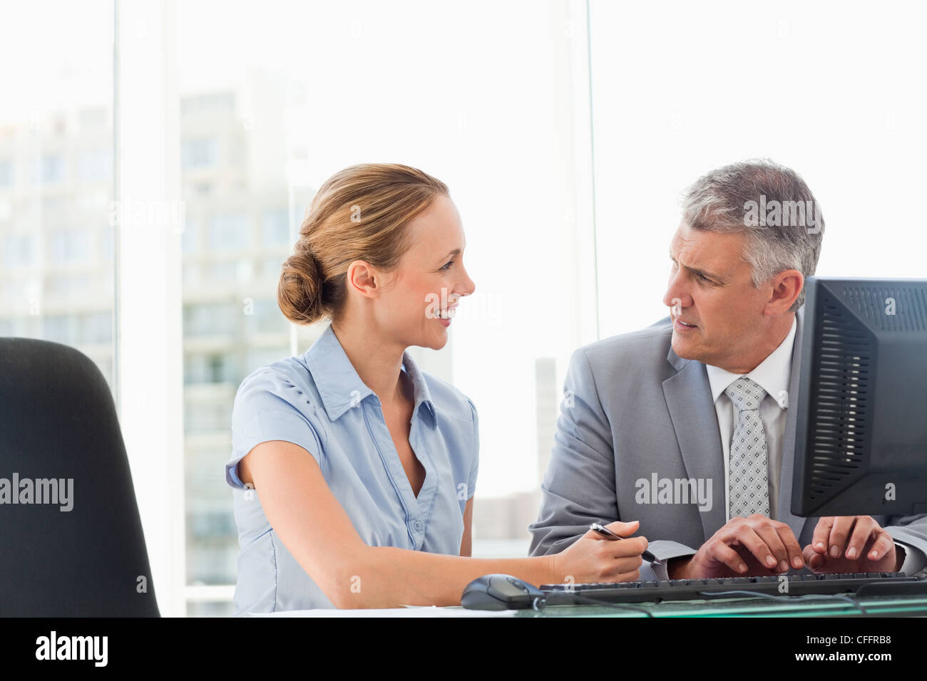 Boss talking to his secretary Stock Photo - Alamy Boss talking to his secretary Stock Photo - Alamy