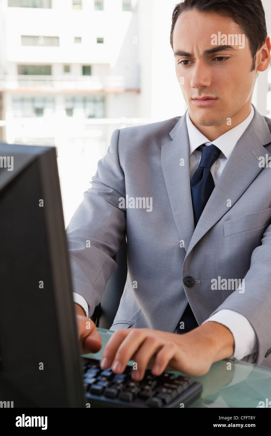Businessman working on his computer Stock Photo - Alamy