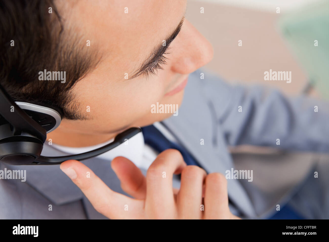 High angle-shot of a man talking with a headset Stock Photo - Alamy