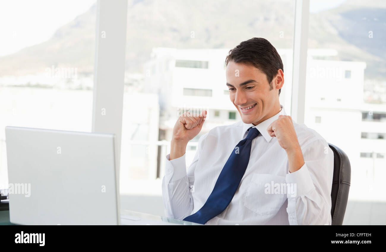 Businessman getting a good news Stock Photo - Alamy