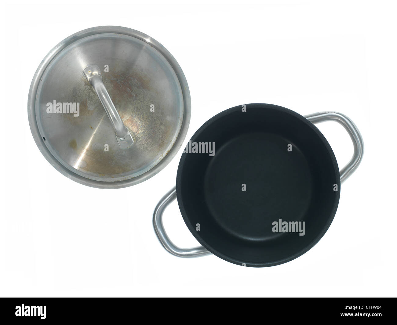 Pots and pans isolated against a white background Stock Photo - Alamy