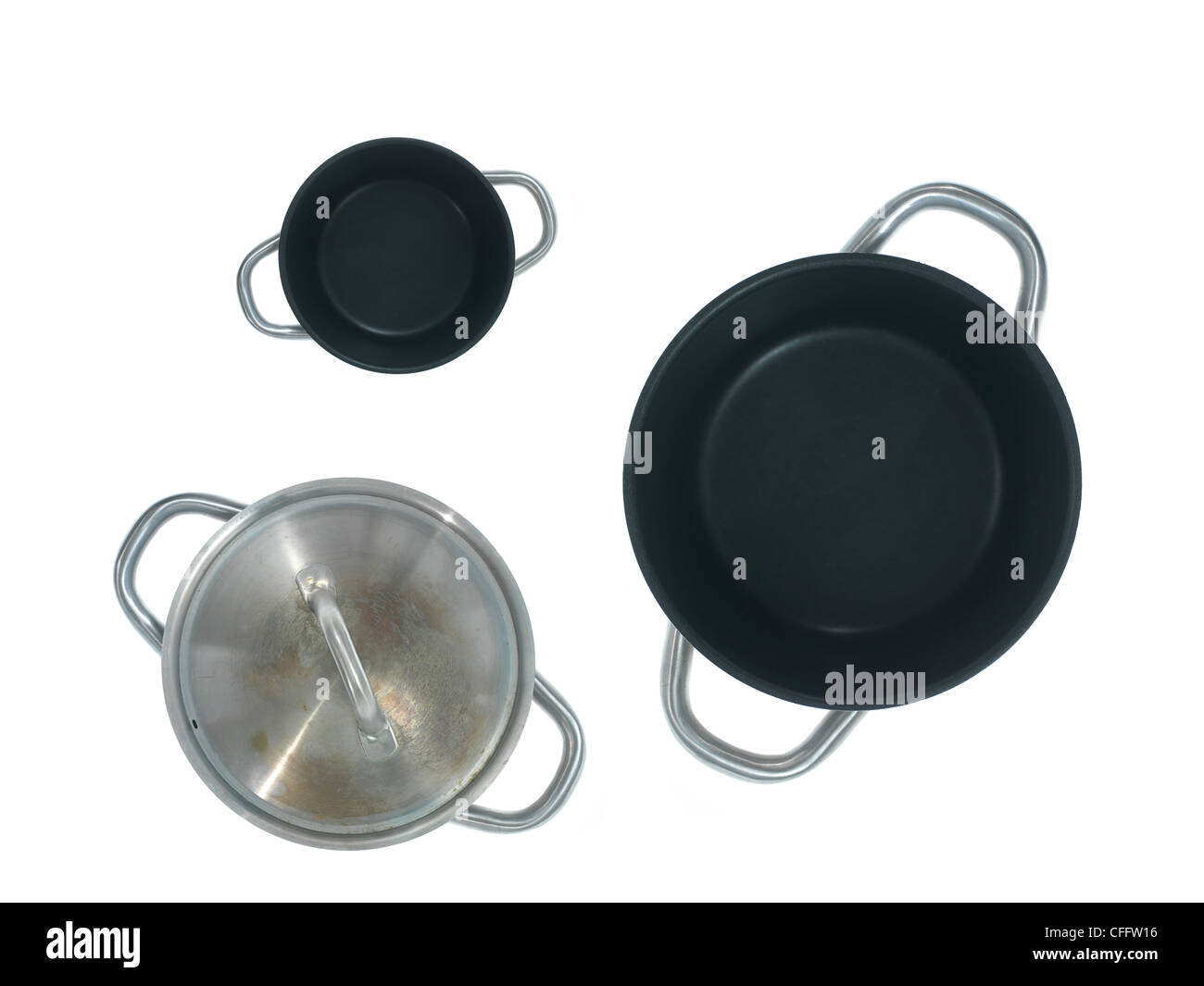 Pots and pans isolated against a white background Stock Photo - Alamy