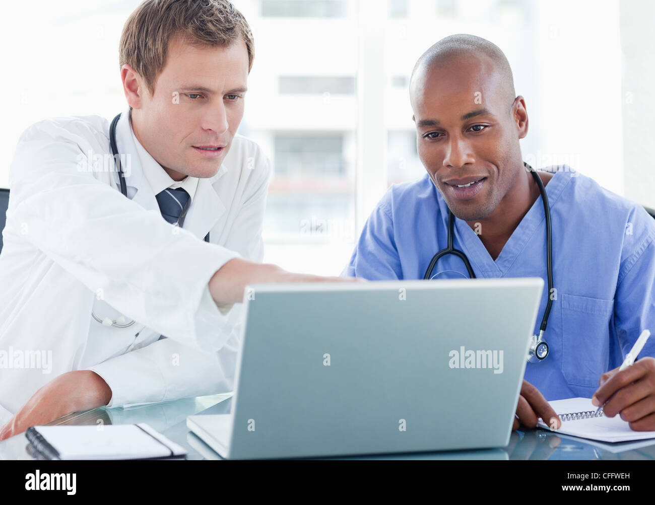 Healthcare professional working laptop hi-res stock photography and ...