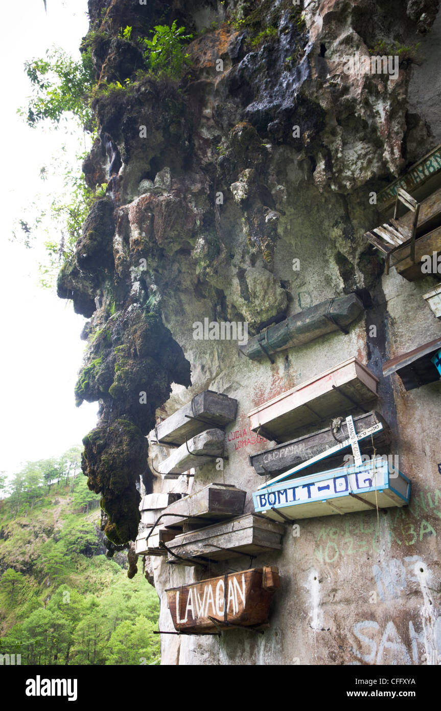 a close look of hanging coffins in Sagada, Philippines. A unique way of ...
