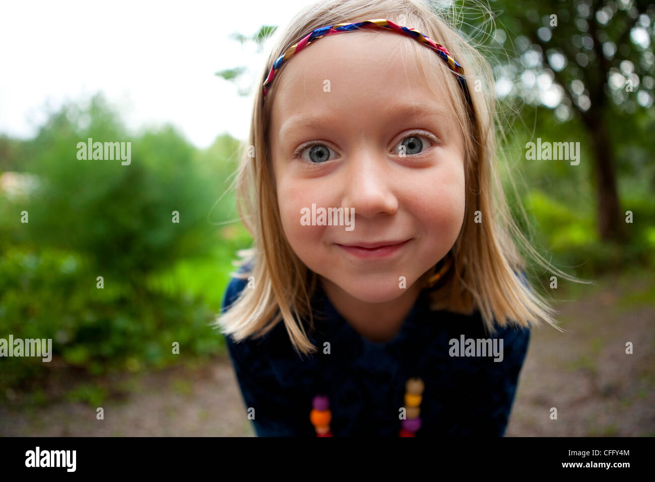 Little girl outdoors on a beautiful summer afternoon Stock Photo - Alamy