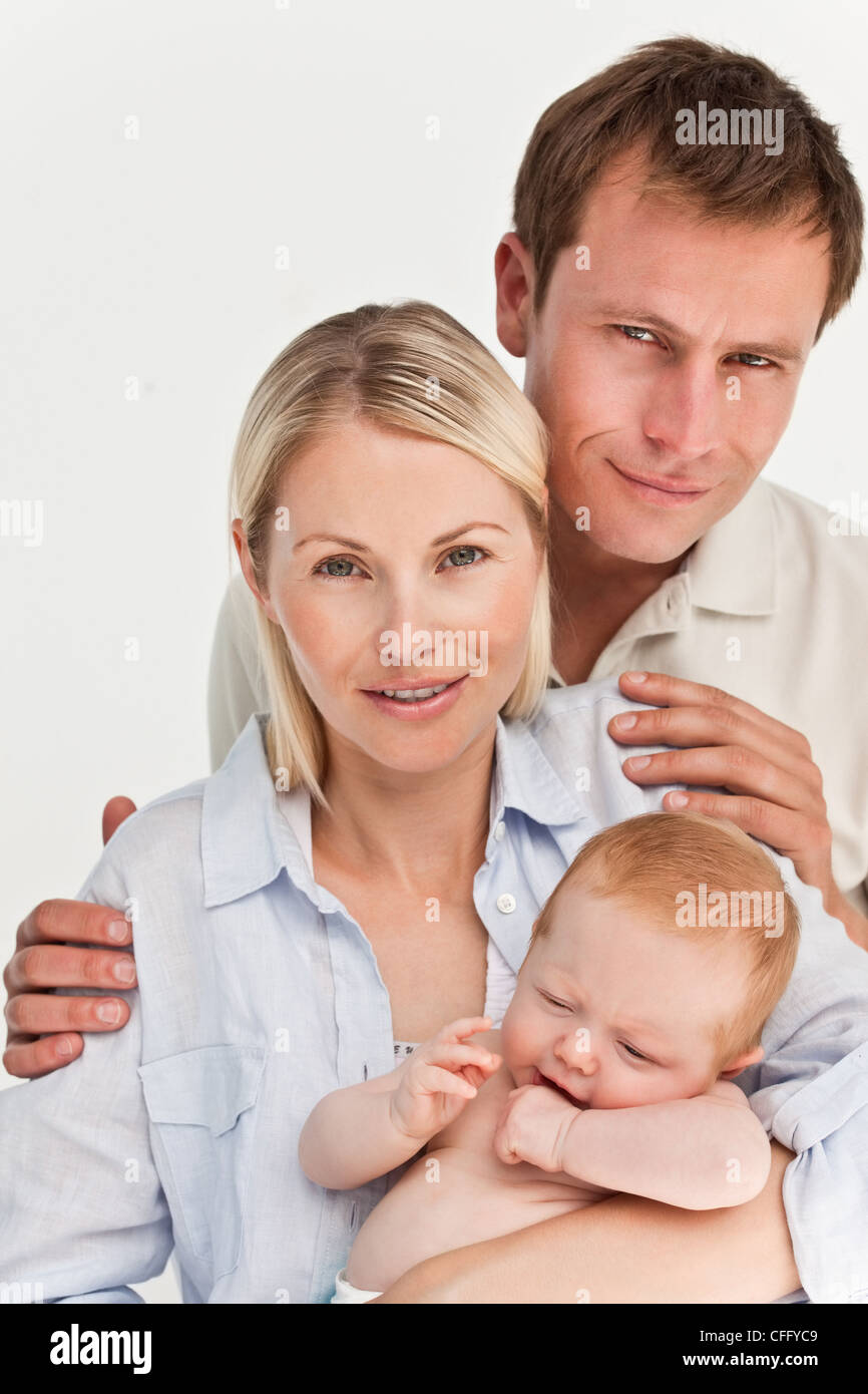 Close up of happy young family Stock Photo - Alamy